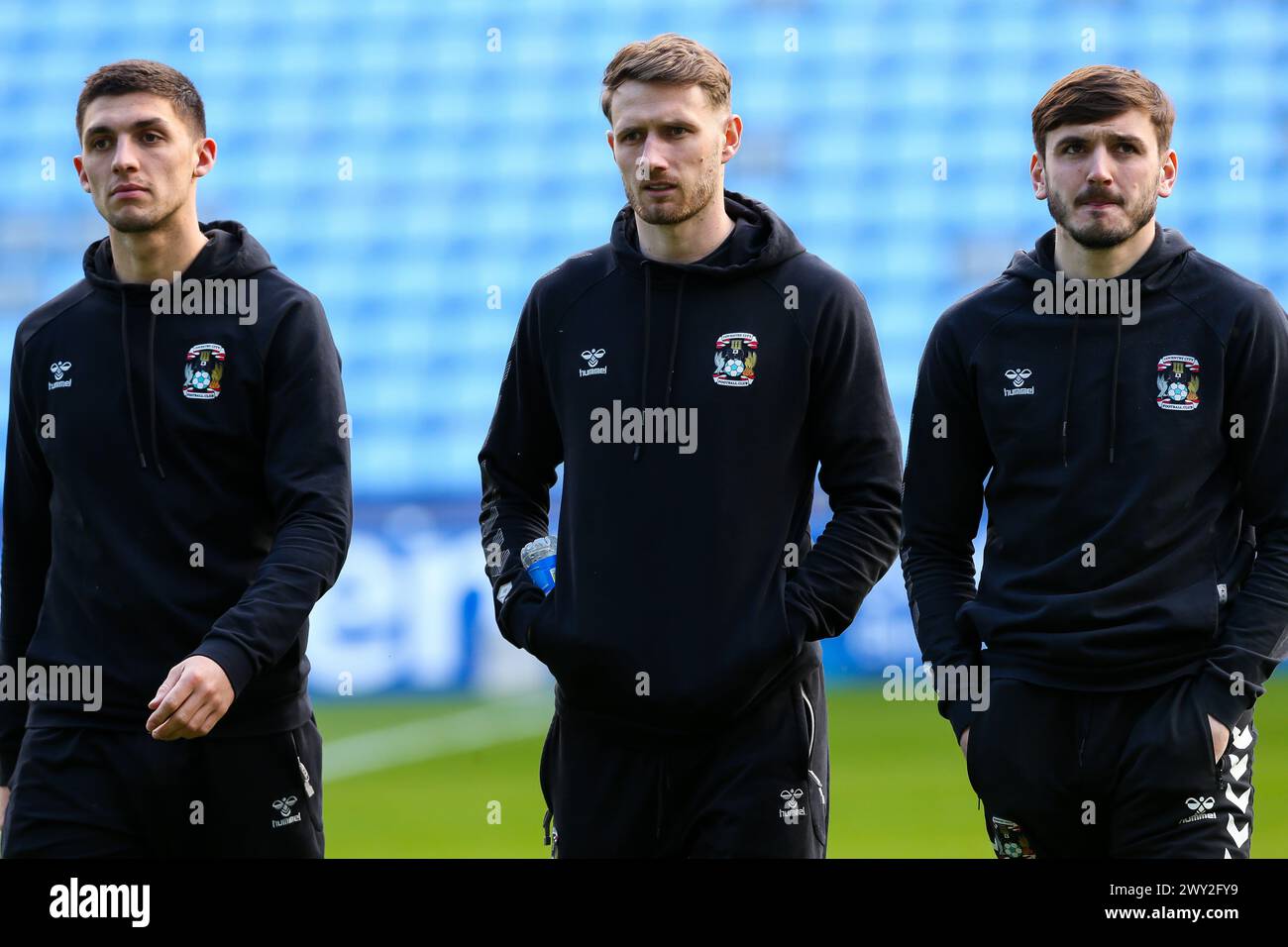 Coventry City's Bobby Thomas, goalkeeper Bradley Collins and Liam ...