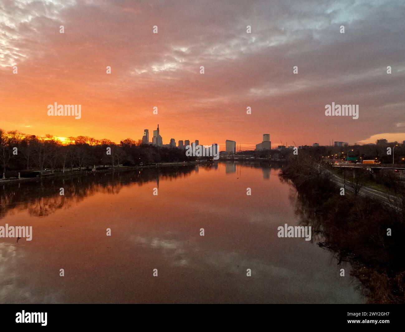 The sun rises over the Philadelphia skyline and the Schuylkill River ...