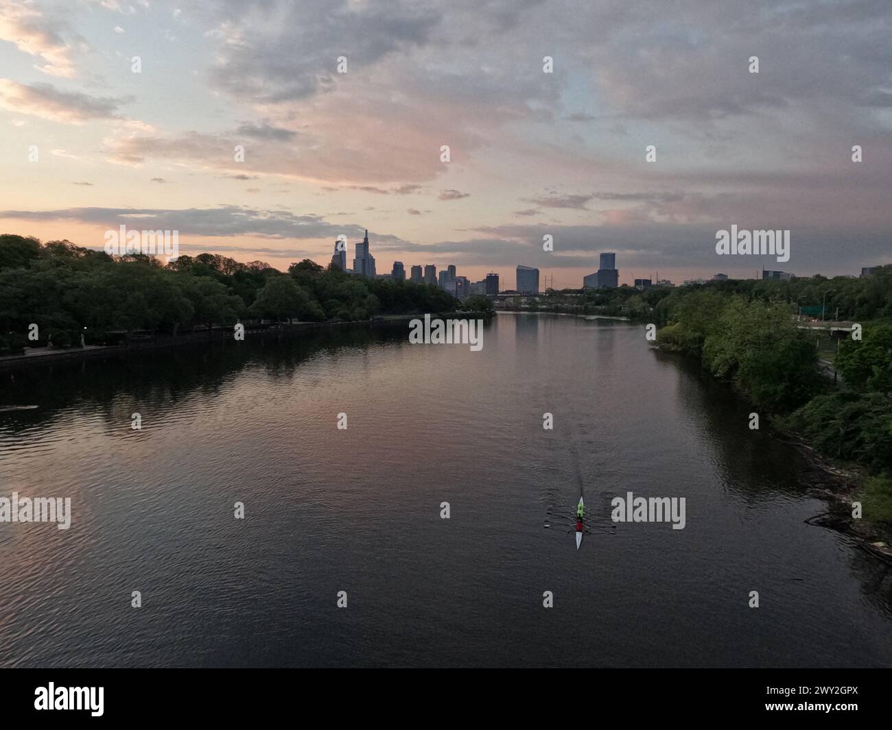Rowers head north along the Schuylkill River with the Philadelphia ...