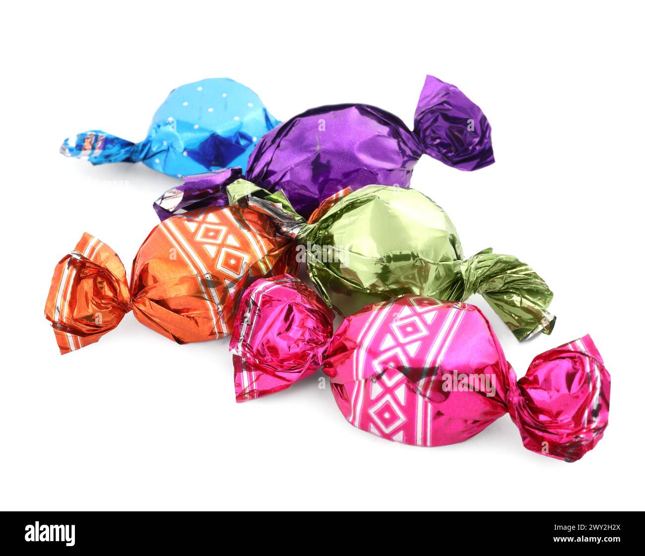 Sweet candies in colorful wrappers on white background Stock Photo - Alamy