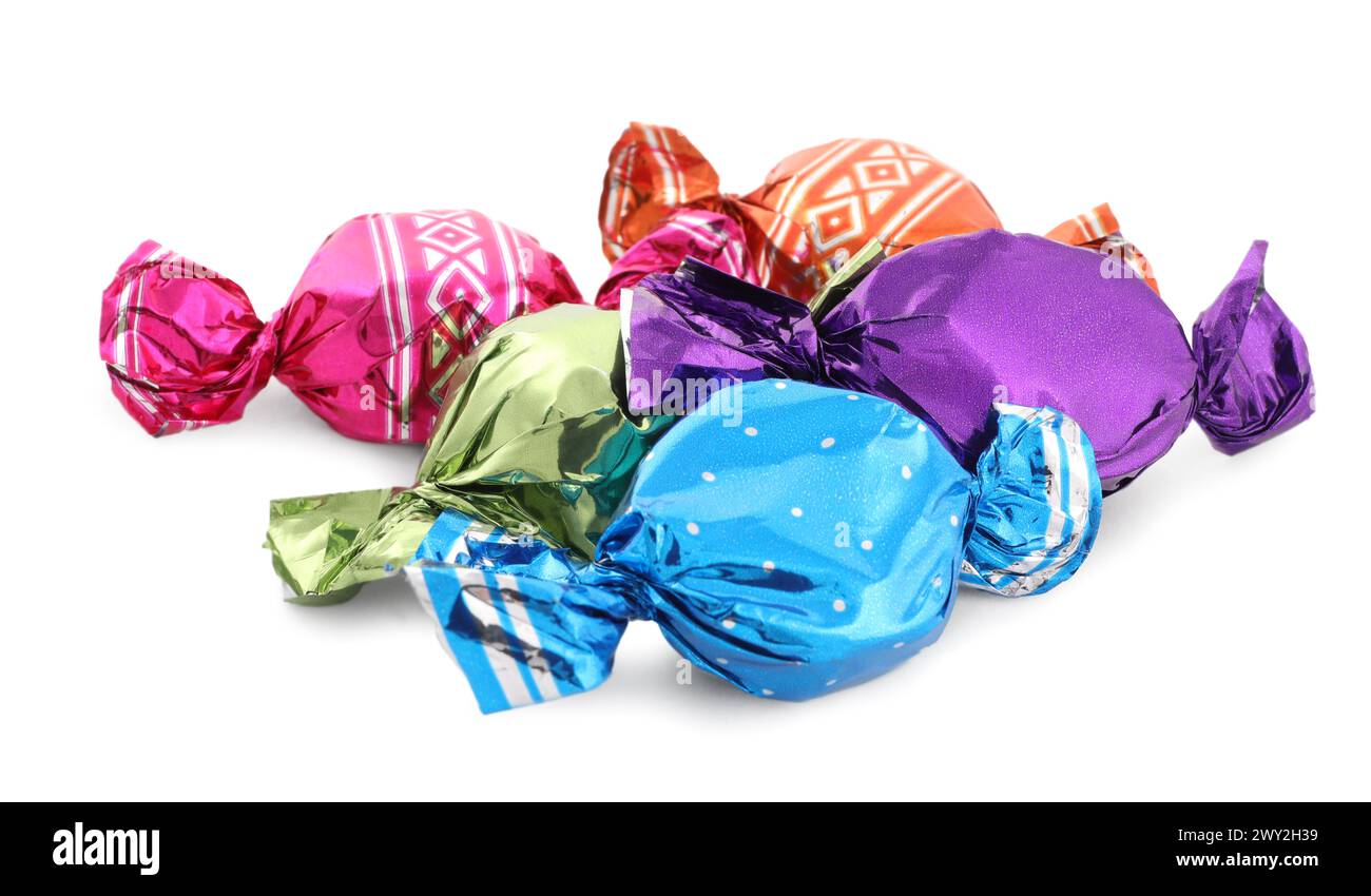 Sweet candies in colorful wrappers on white background Stock Photo - Alamy