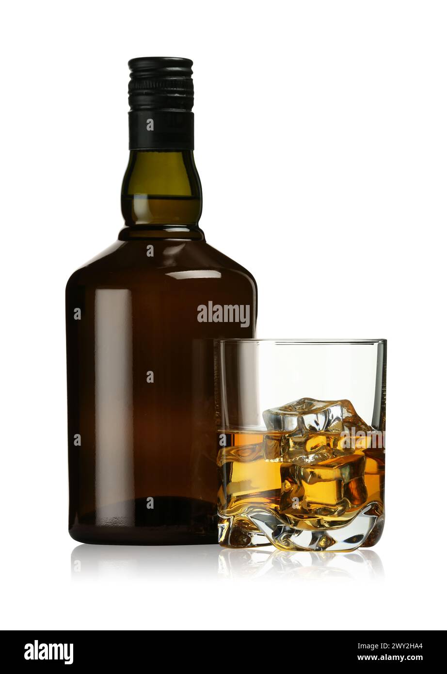Whiskey in glass and bottle isolated on white Stock Photo - Alamy