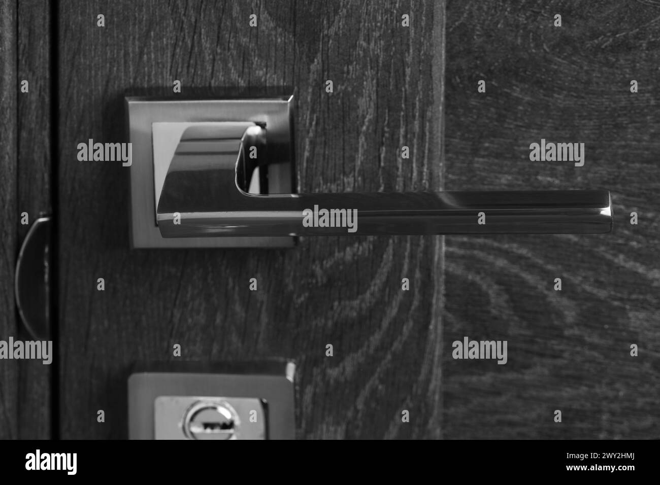 Installing door handle Black and White Stock Photos & Images - Alamy