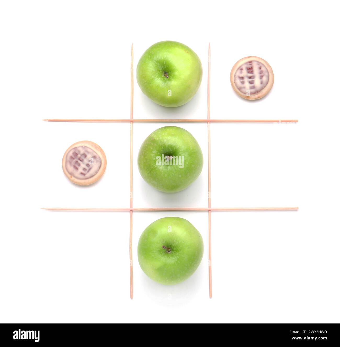 Tic tac toe game made with apples and cookies isolated on white, top ...