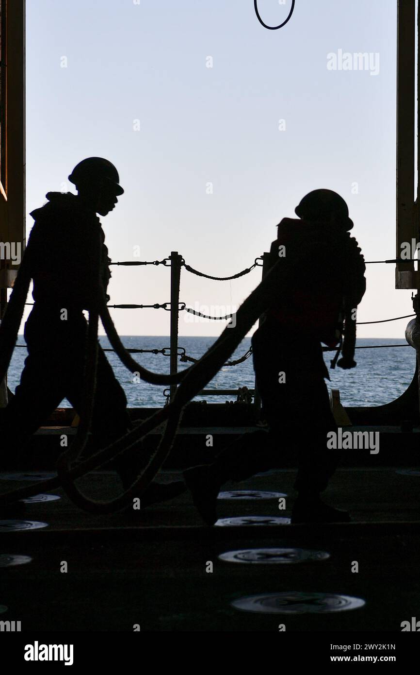Sailors assigned to the Wasp-class amphibious assault ship USS Boxer ...