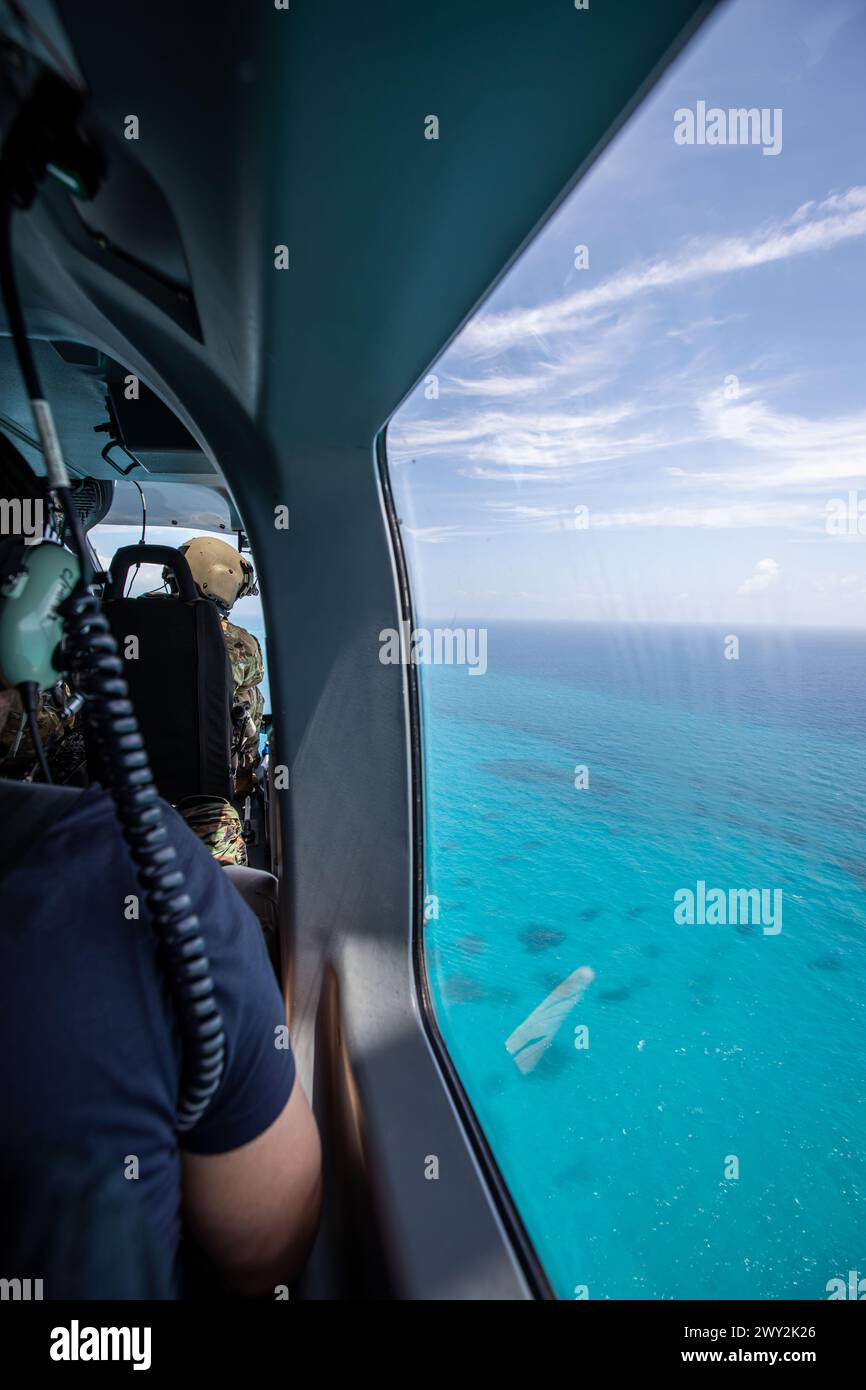 Florida Army National Guard Soldiers conduct an aerial surveillance ...