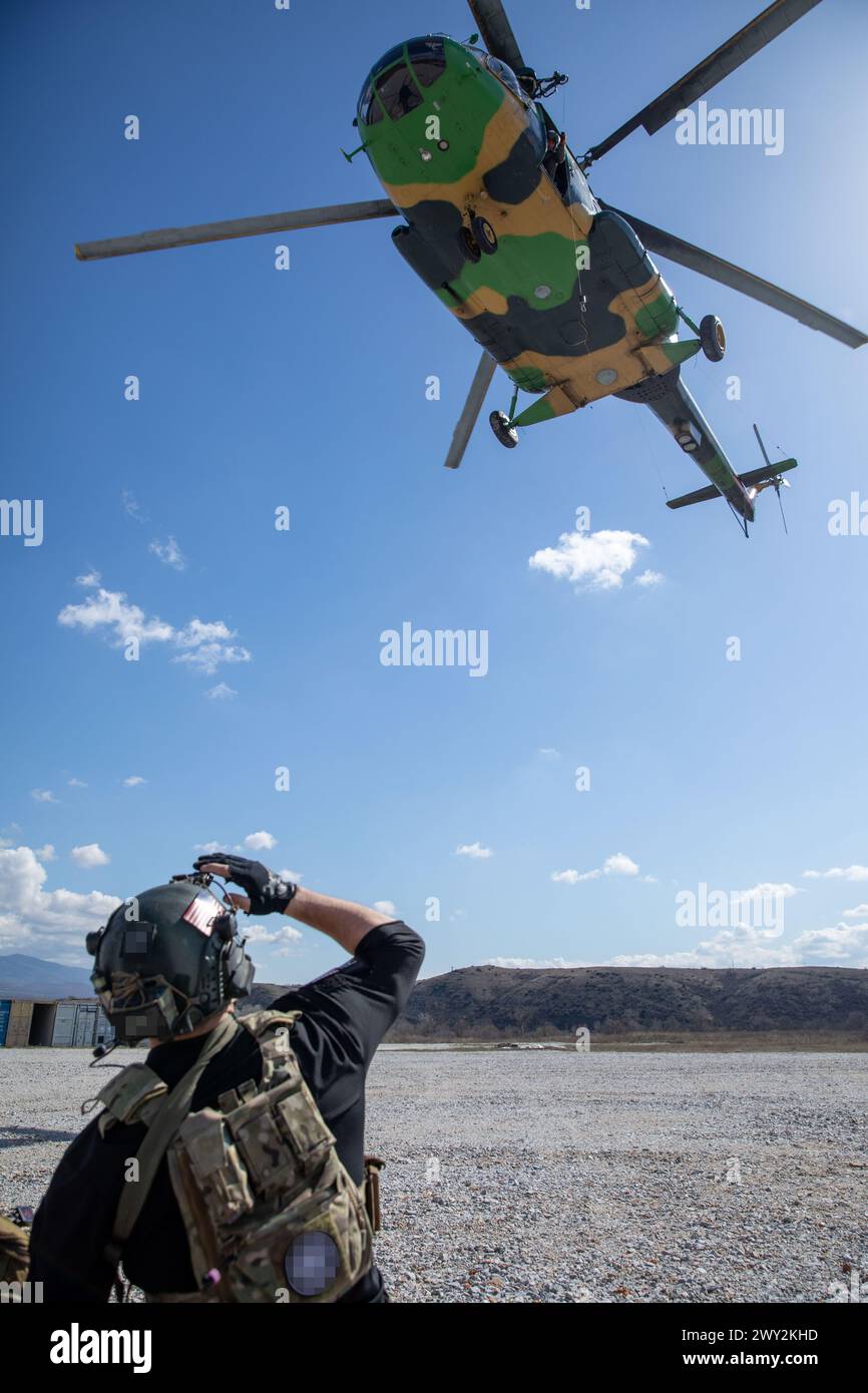 A Green Beret with 10th Special Forces Group (Airborne) conducts hoist ...