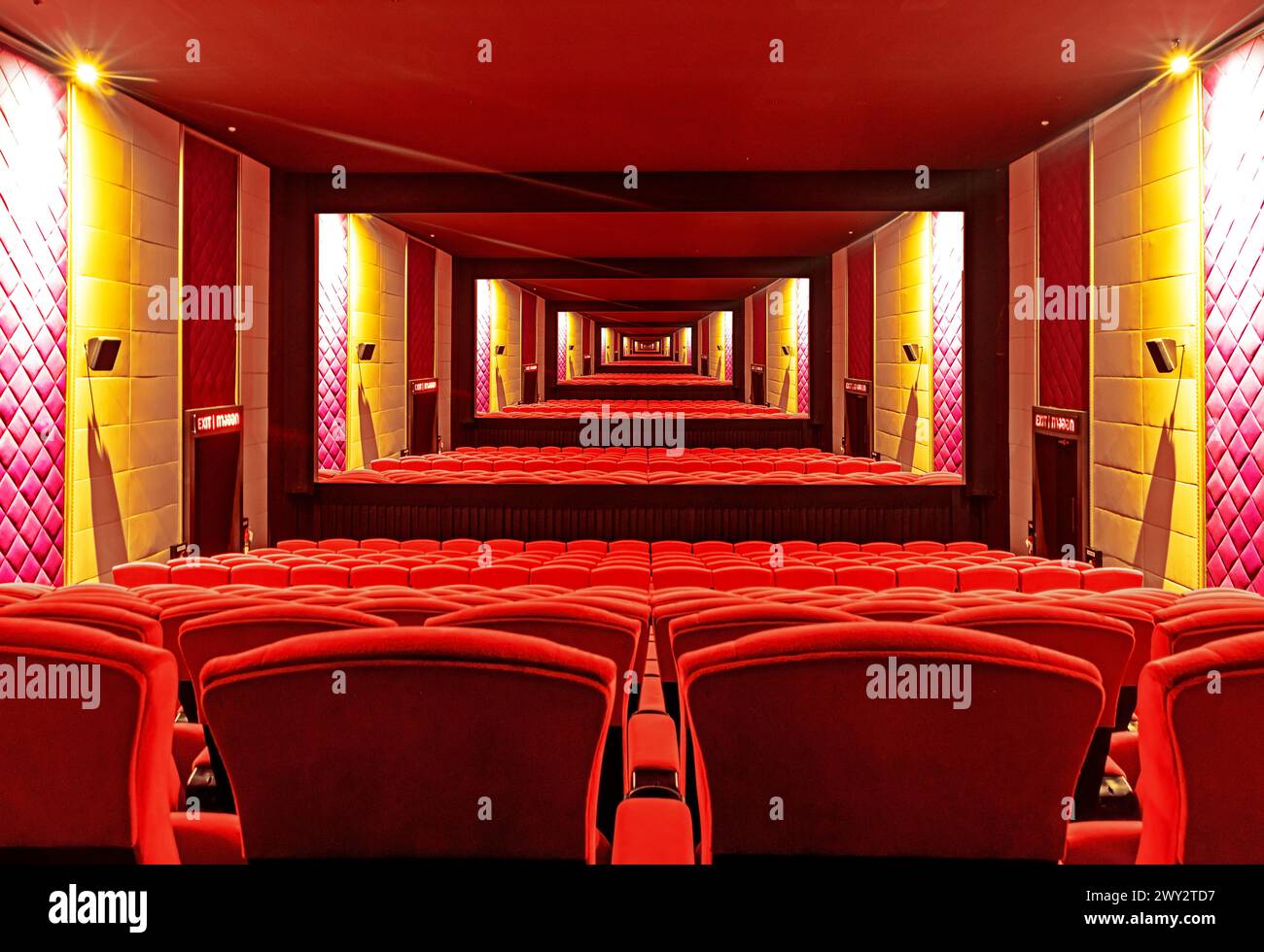 An empty movie theater with a infinitely projection an empty movie theater Stock Photo - Alamy