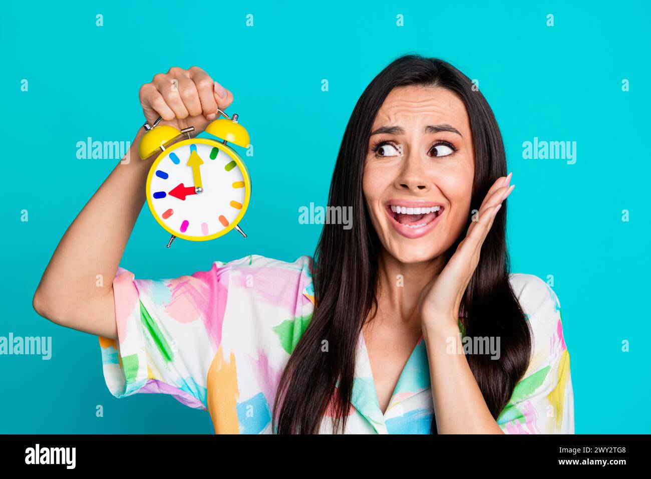 Photo of nice lady open mouth scream hold alarm clock wear shirt ...