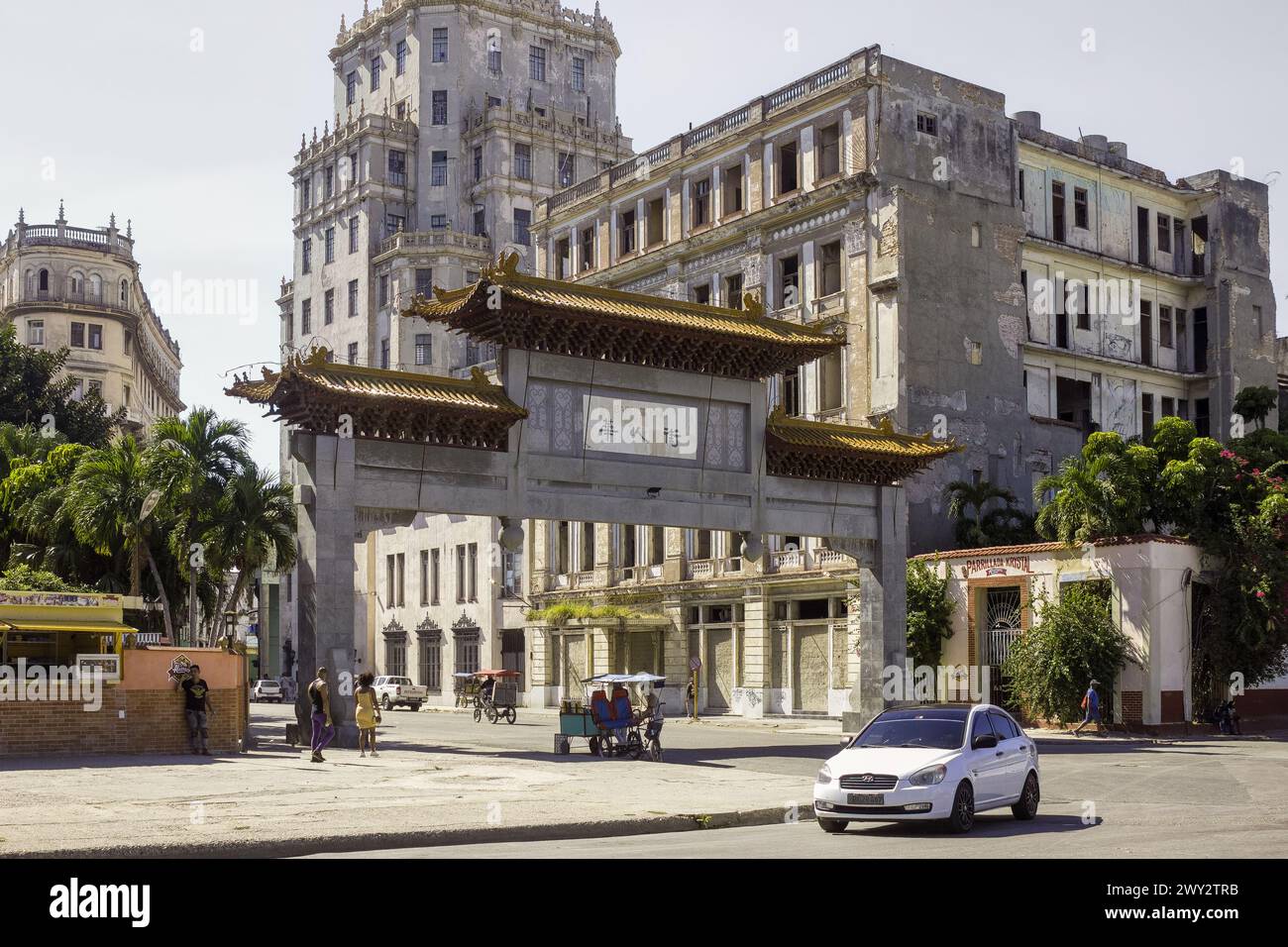 Entrance to Chinatown and run-down buildings in the area, Havana, Cuba ...