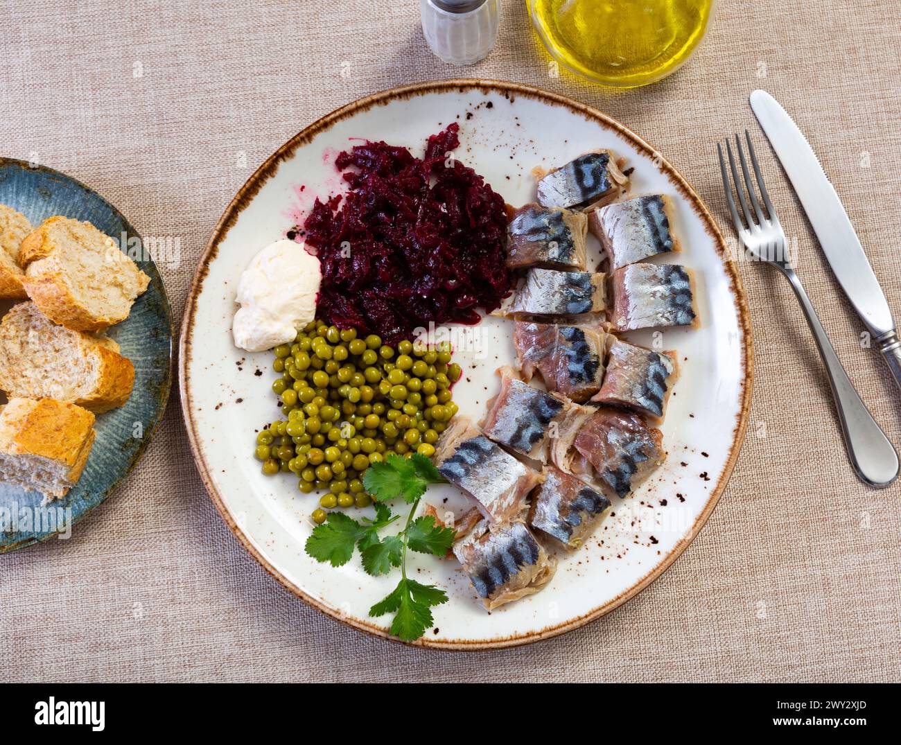 Cold smoked mackerel with beetroot and green peas Stock Photo - Alamy