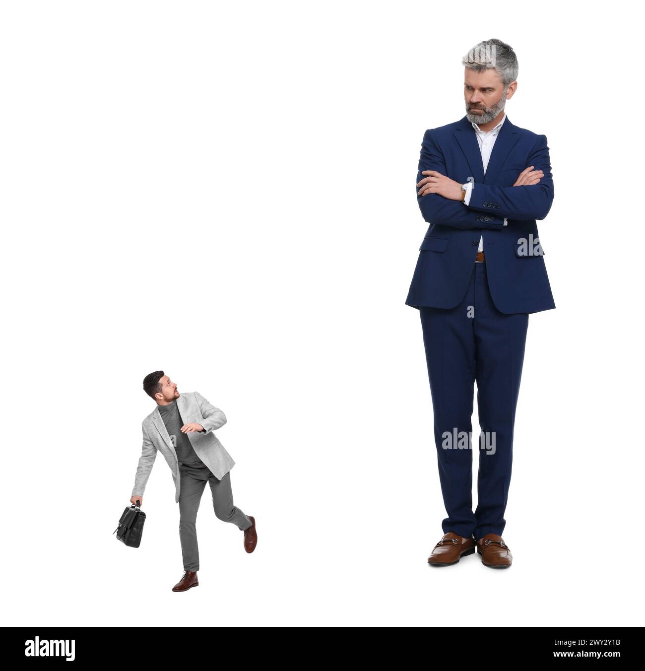 Small man running from giant boss on white background Stock Photo - Alamy