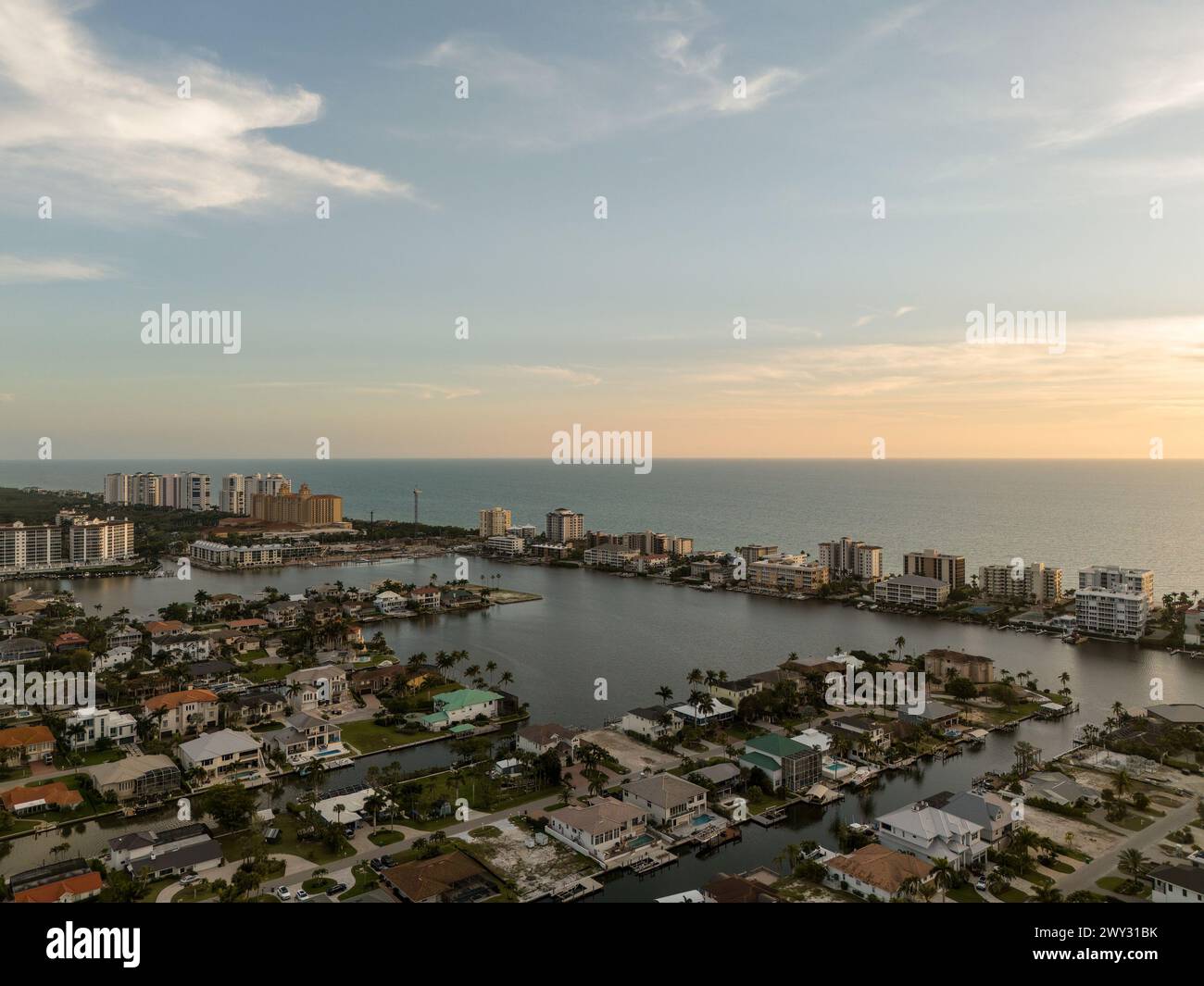 Sunset aerial sky view of Vanderbilt Beach and the ocean in Naples ...