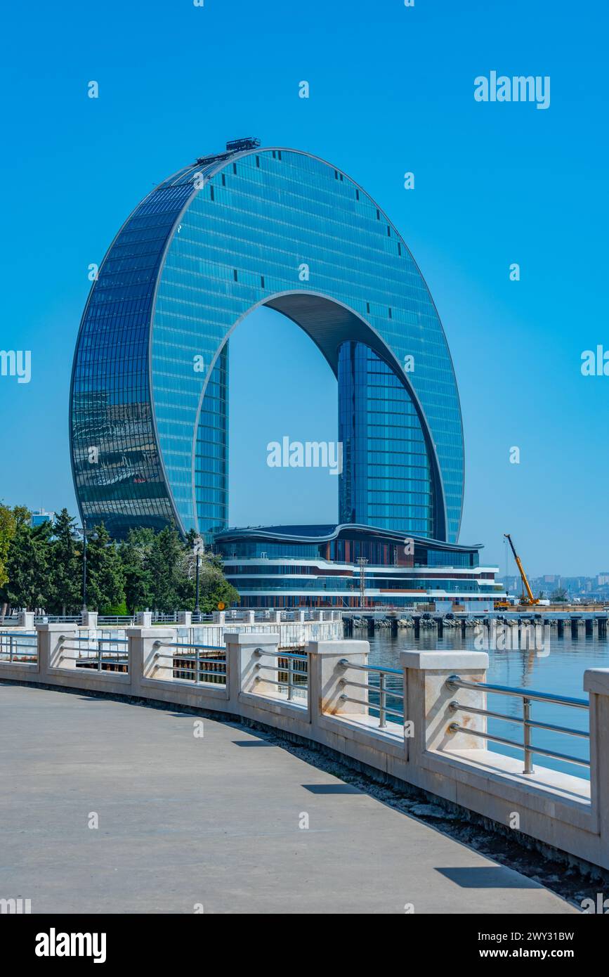 The crescent building at the waterfront of Baku, Azerbaijan Stock Photo ...