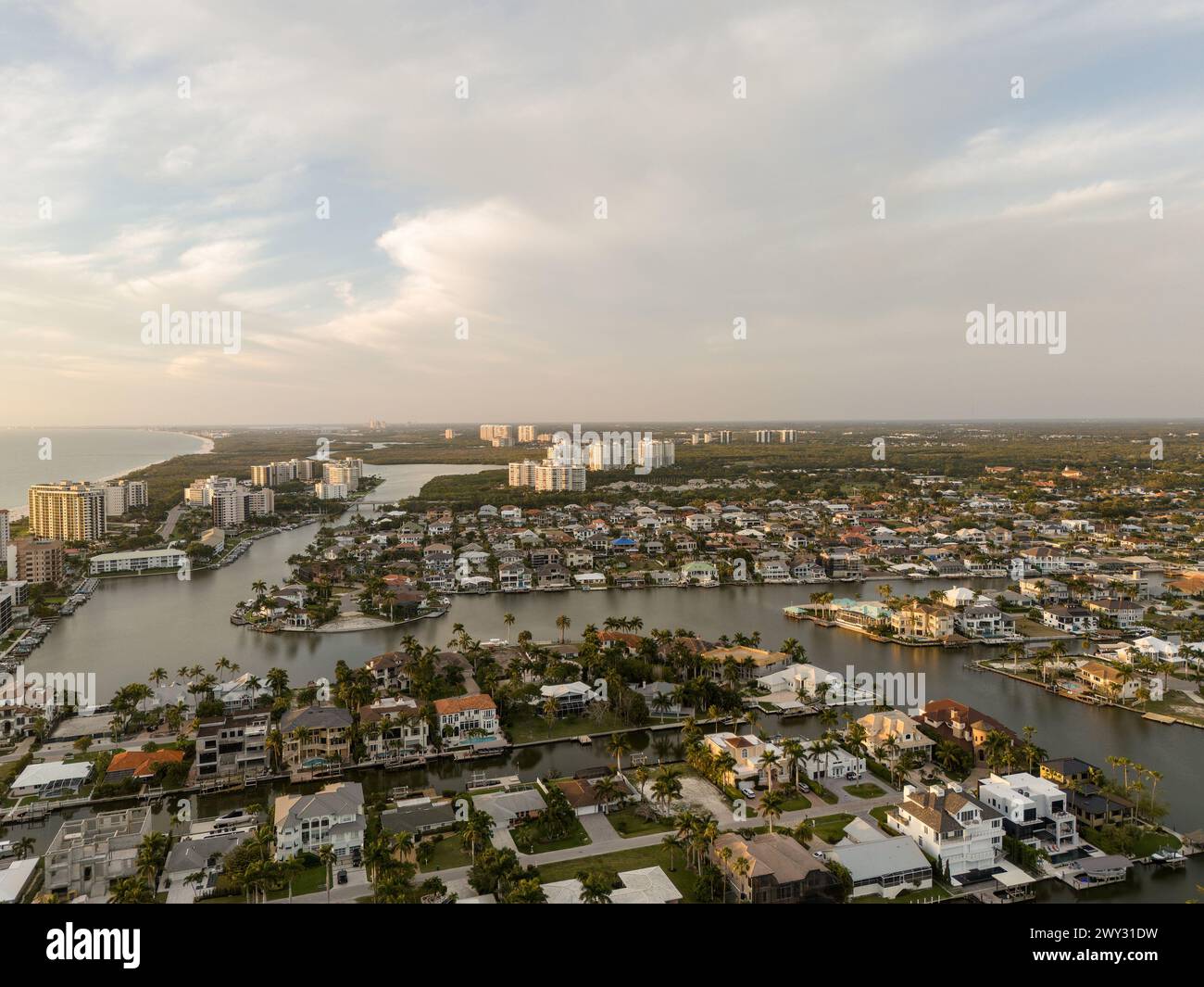 Sunset aerial sky view of Vanderbilt Beach and the ocean in Naples ...