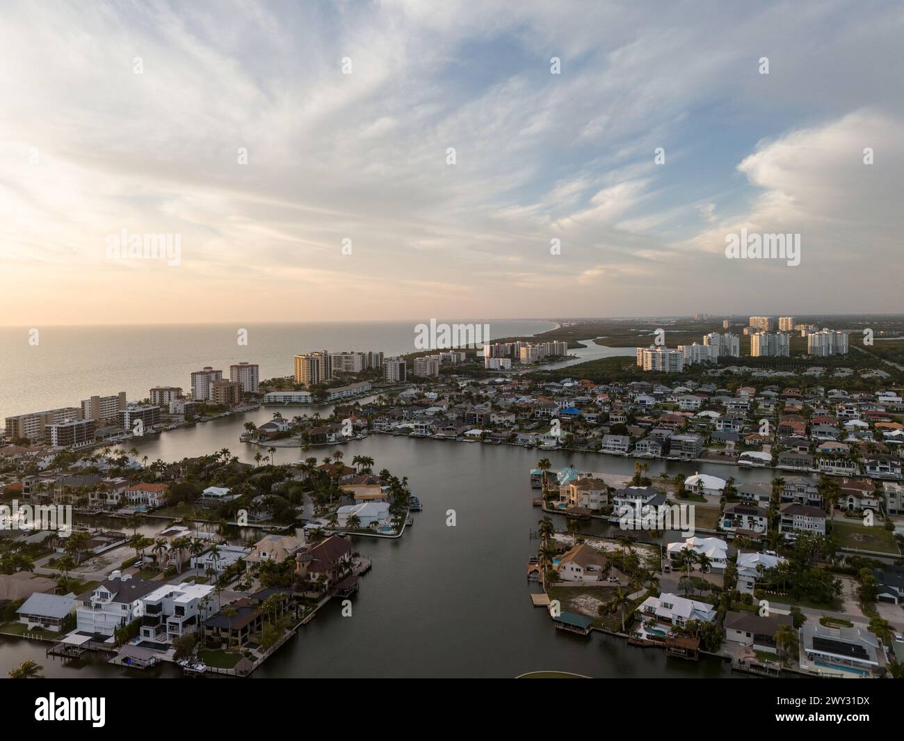 Sunset aerial sky view of Vanderbilt Beach and the ocean in Naples ...