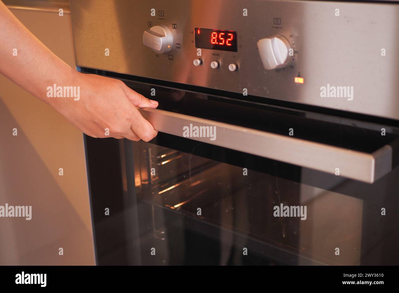 Male hand turning dial hi-res stock photography and images - Alamy