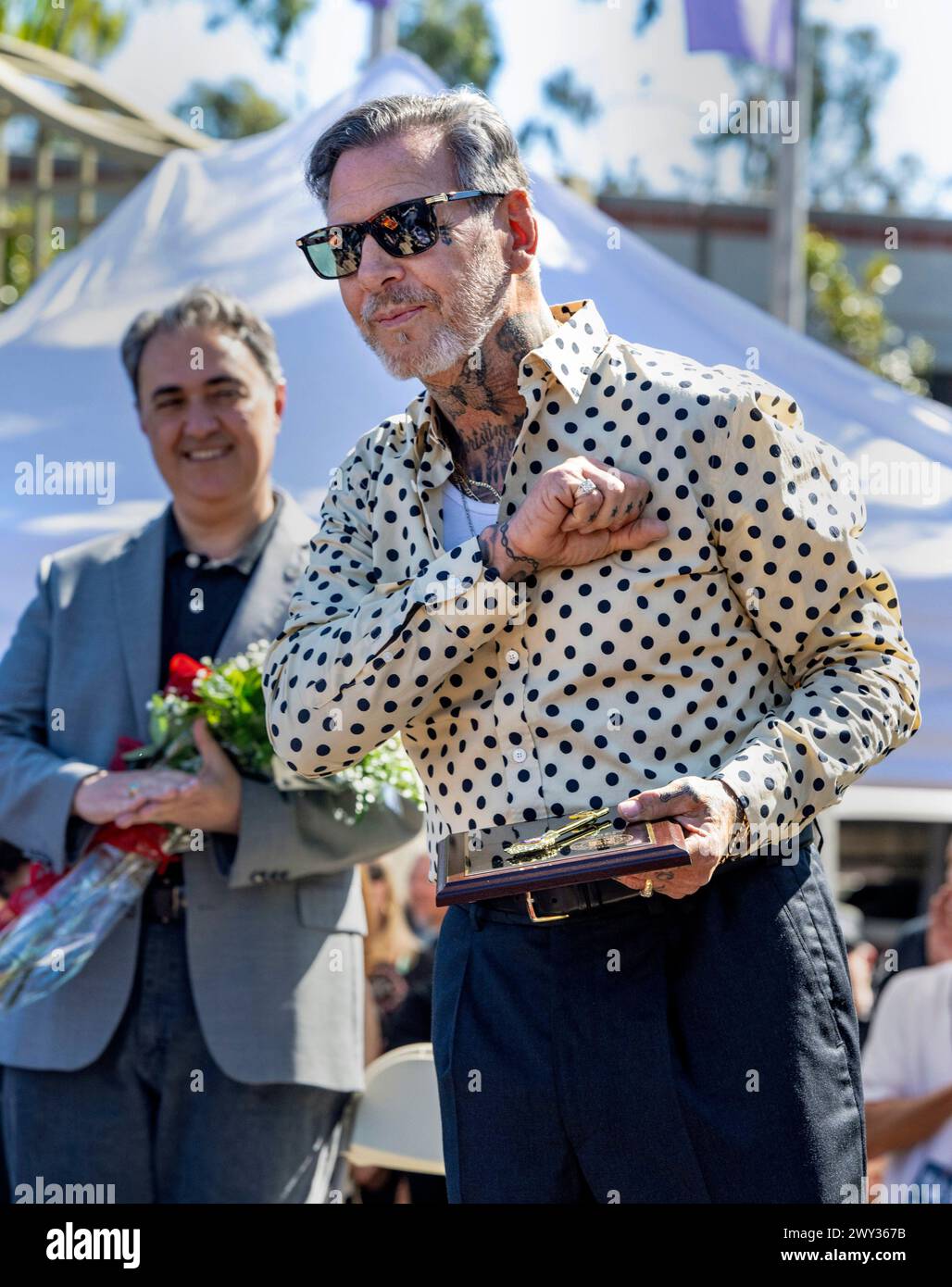 Mike Ness, of the pioneering punk rock band Social Distortion, pumps ...