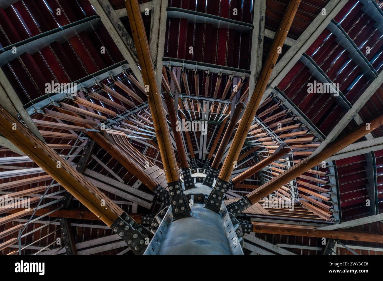 View of wooden observation tower taken from ground level looking up ...