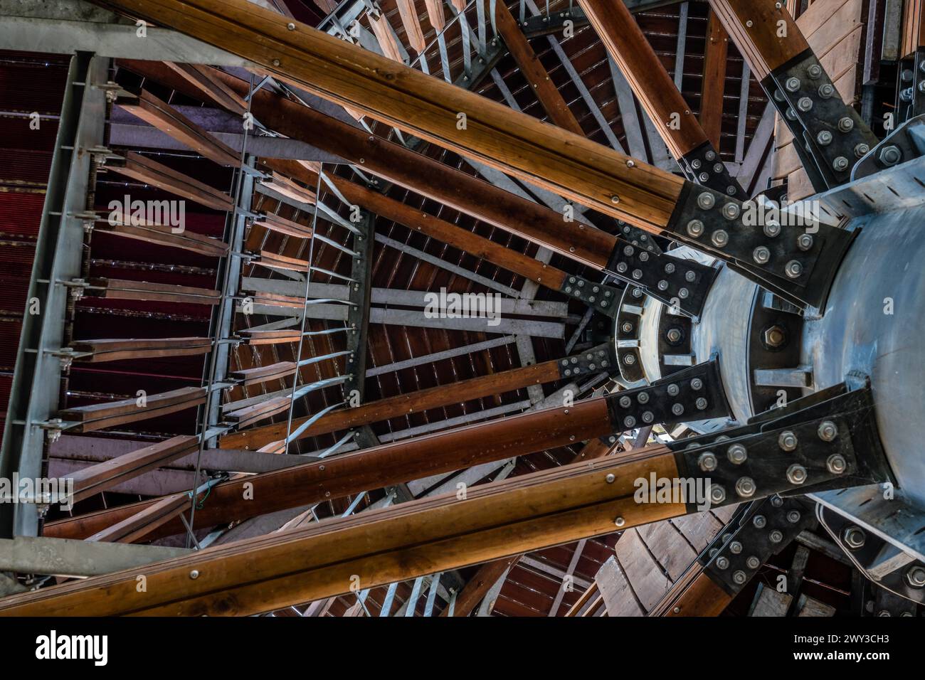 View of wooden observation tower taken from ground level looking up ...