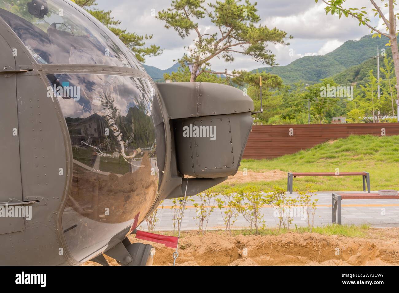 Closeup of front canopy and radar dome of army helicopter used in ...