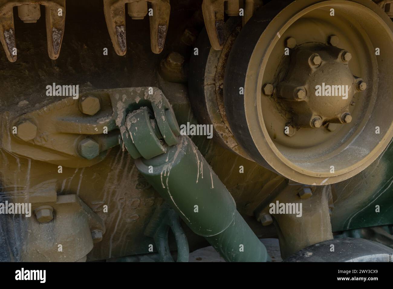 Closeup of wheels and shock absorbers are part of military tank tracks ...