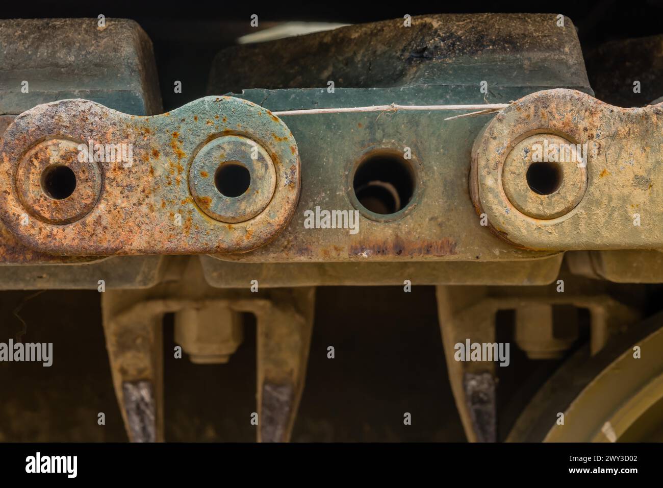 Closeup of large chain links that are part of military tank movable ...