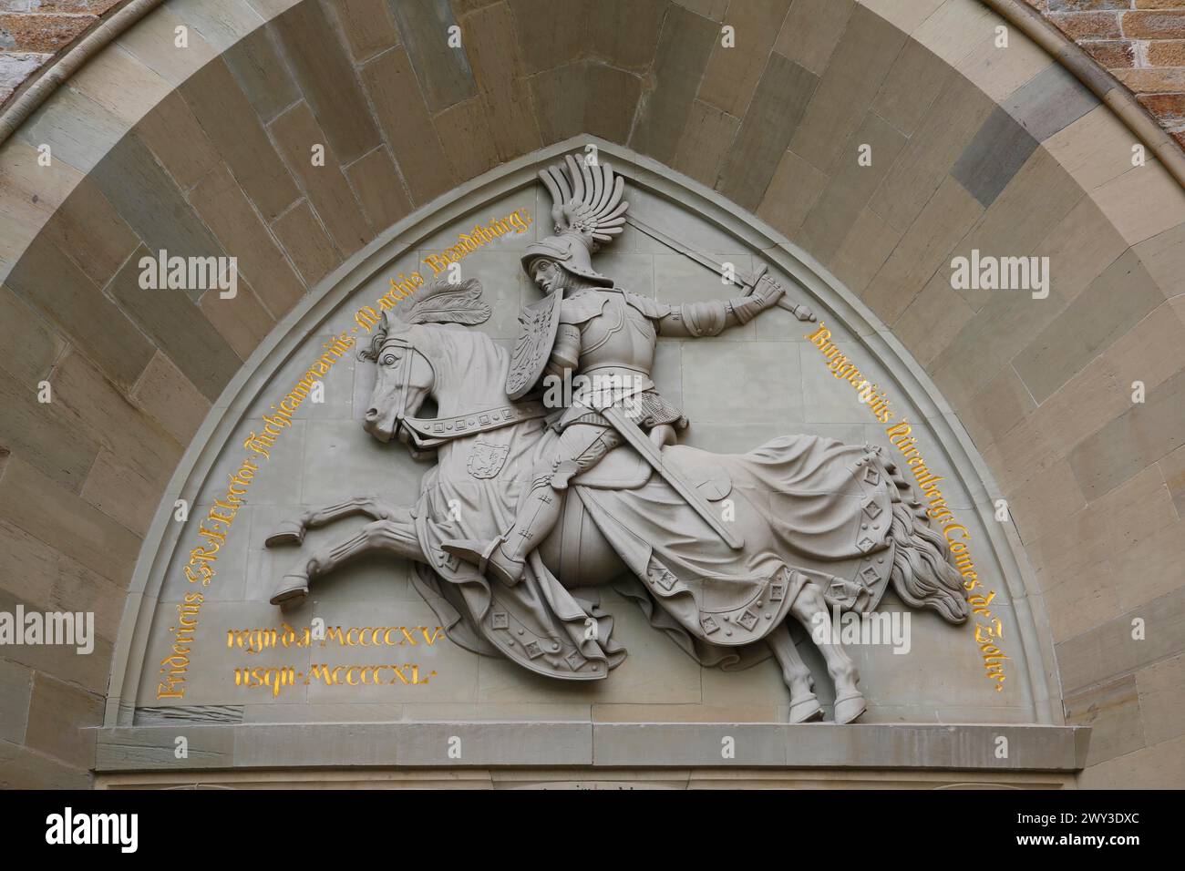 Eagle Gate, stone relief on the outer castle gate, knight figure on ...