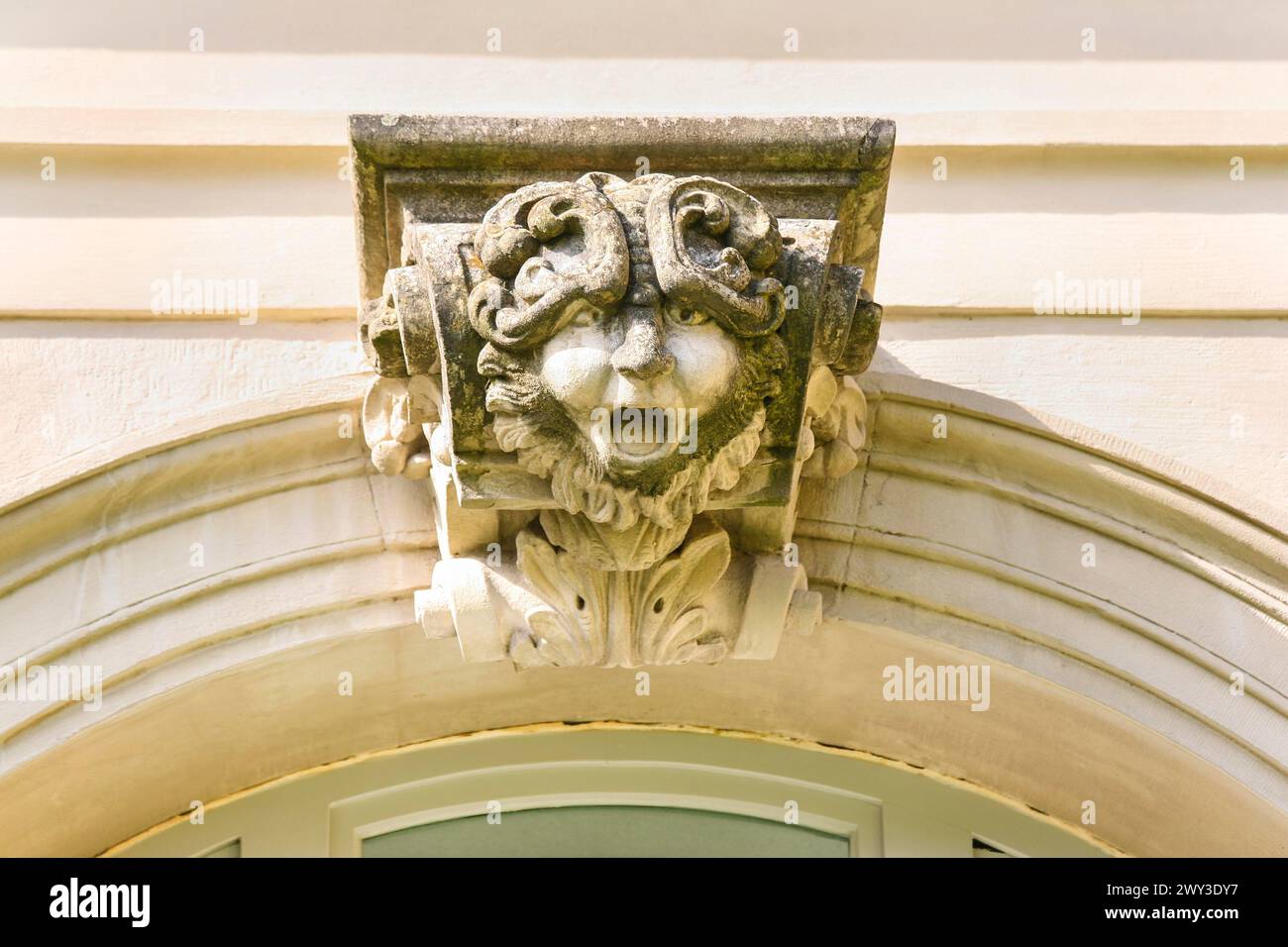 Mythical creature above archway, stone figure, face, Winnental Castle ...