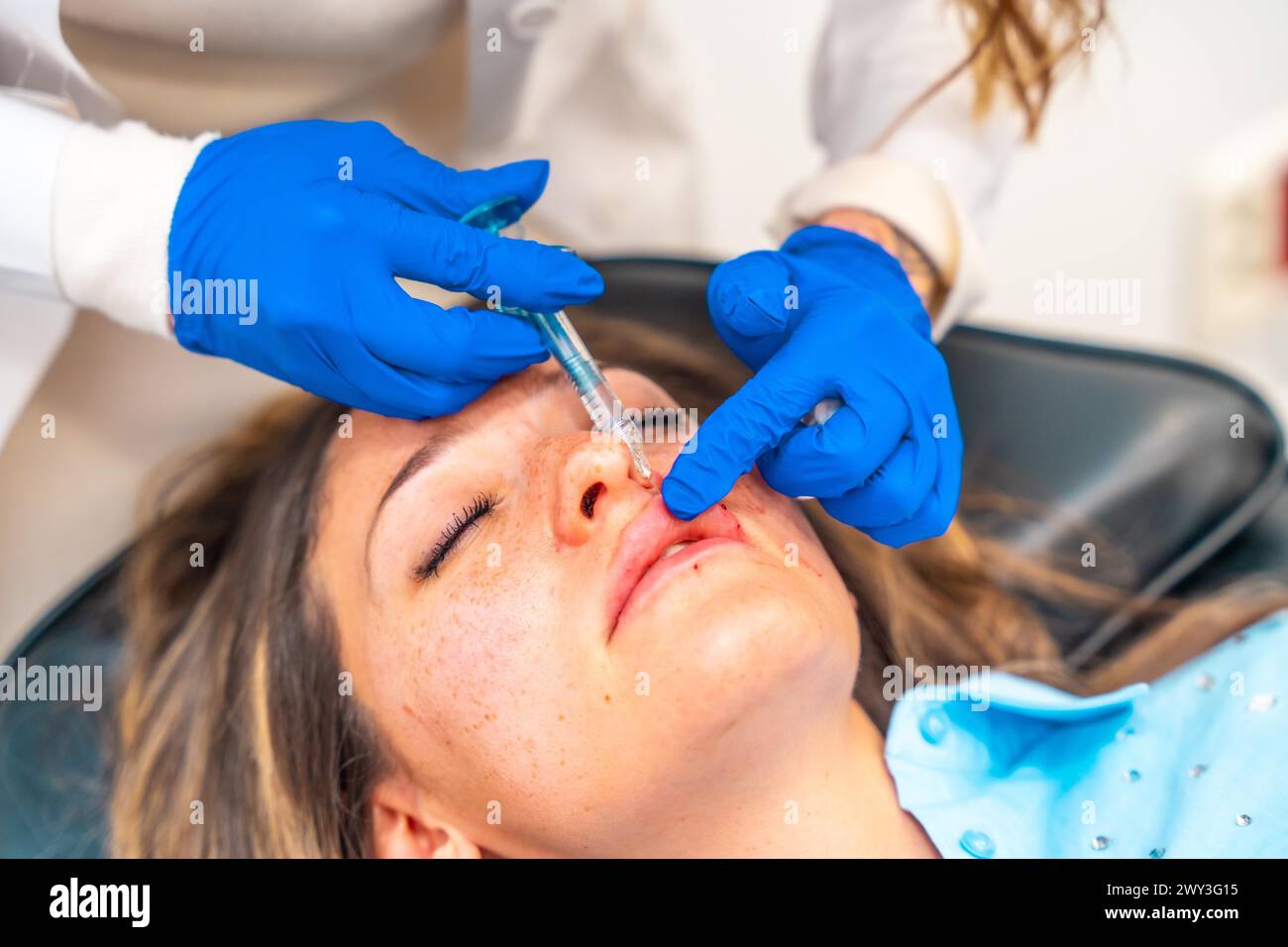Dermatologist injecting botox in hi-res stock photography and images ...