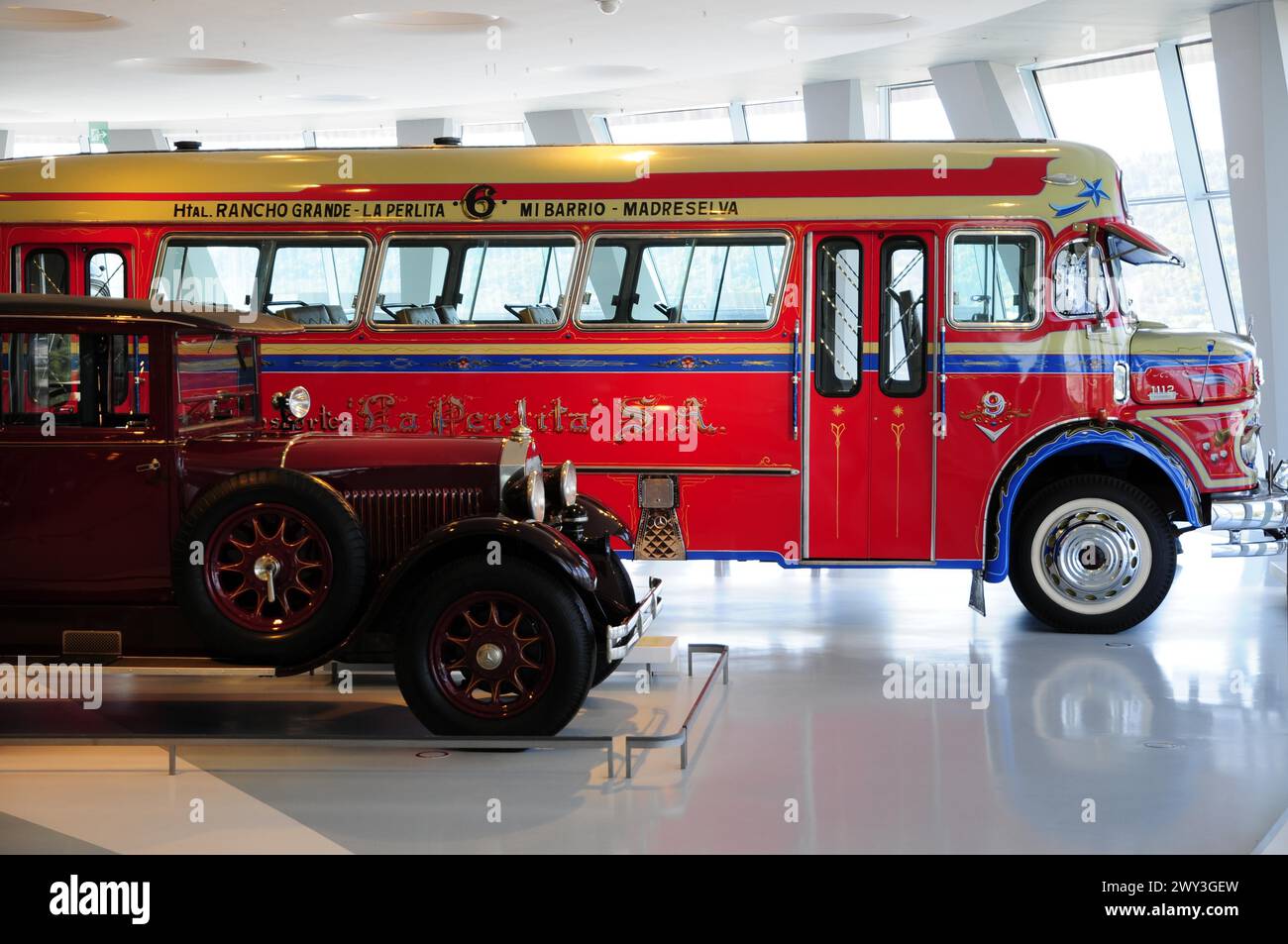 Red historic Mercedes-Benz bus as a fire engine in a vehicle exhibition ...