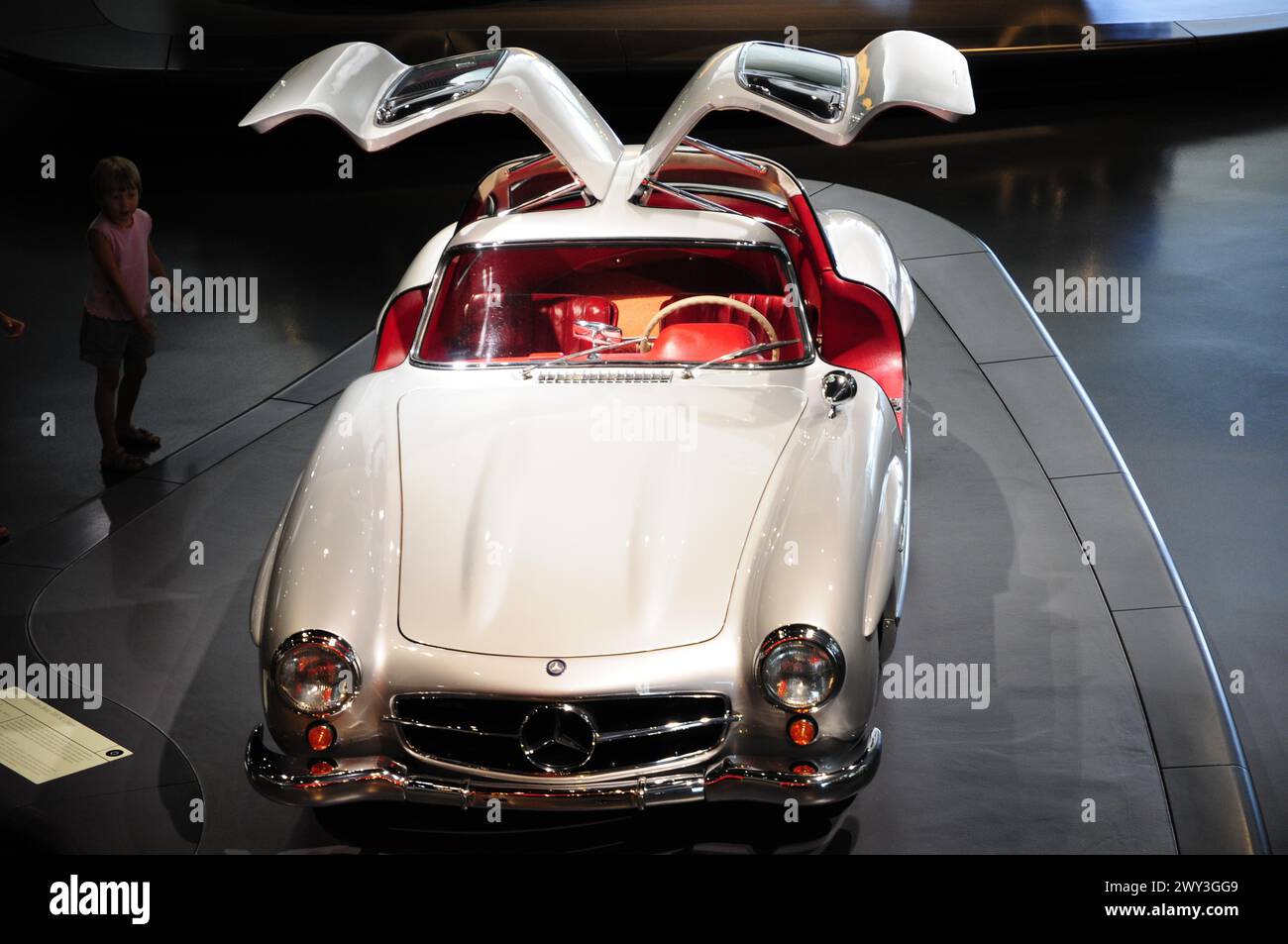 Museum, Mercedes-Benz Museum, Stuttgart, White classic Mercedes sports car with open gullwing ...