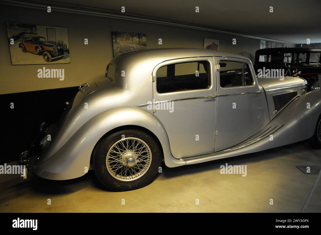 Deutsches Automuseum Langenburg, A grey classic car in a garage ...