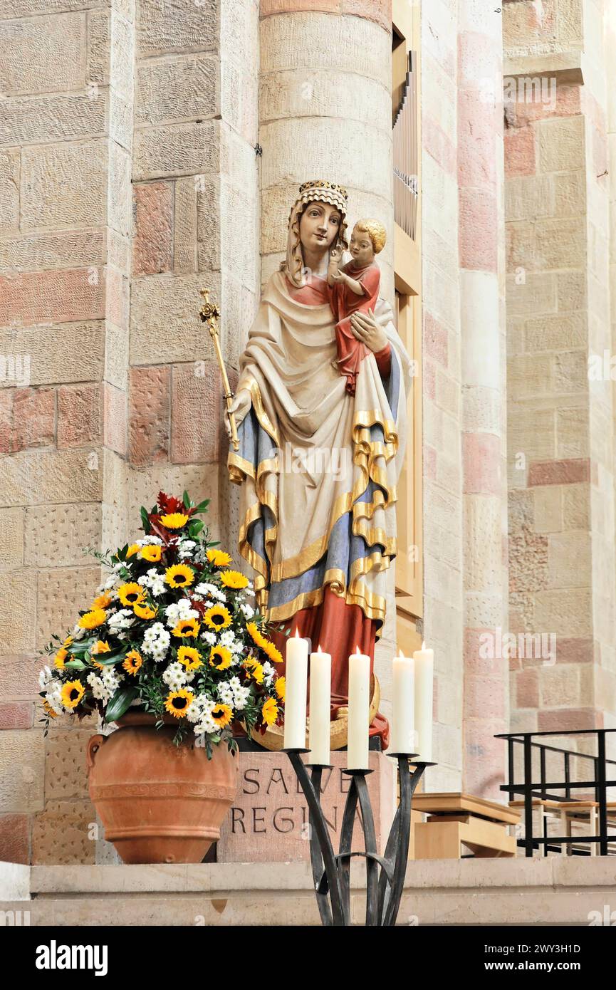 Speyer Cathedral, Colourful sculpture of a saint with child, surrounded ...