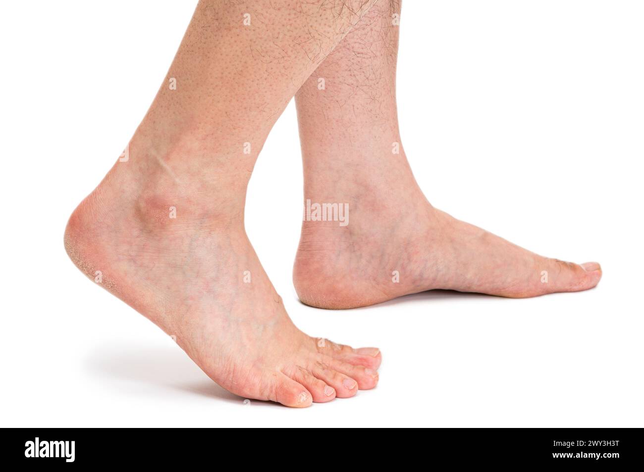 Male foot isolated on white background Stock Photo - Alamy