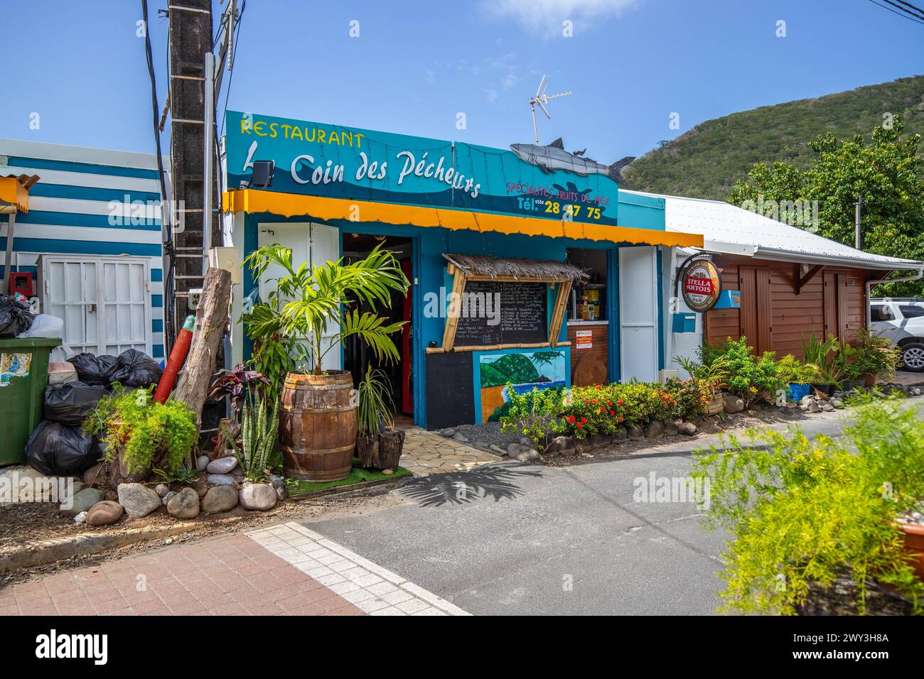 Deshaies, historic Caribbean wooden building of a street in Guadeloupe ...