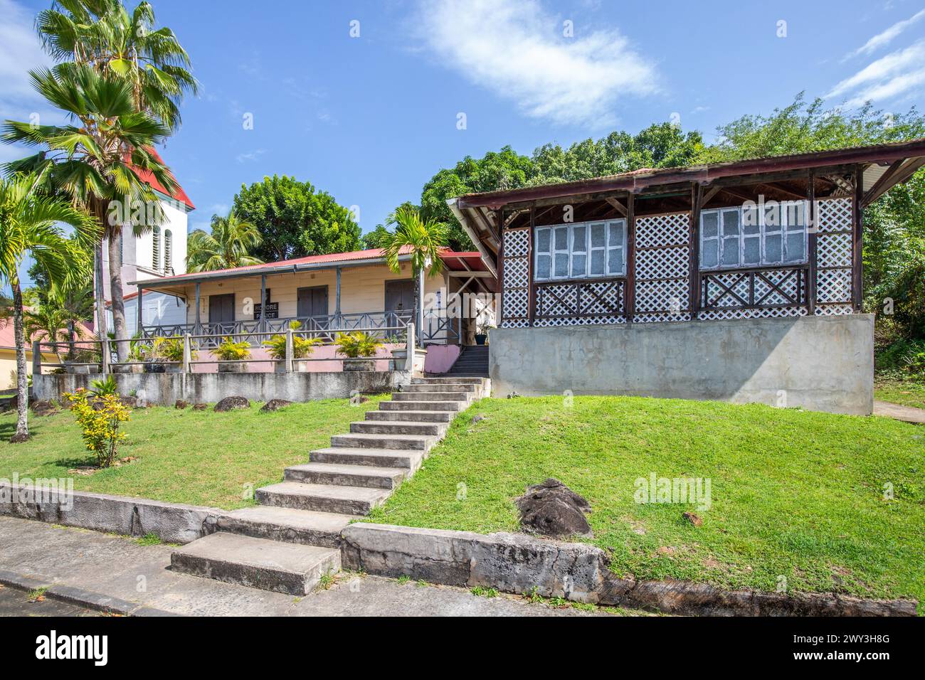Deshaies, historic Caribbean wooden building of a street in Guadeloupe ...