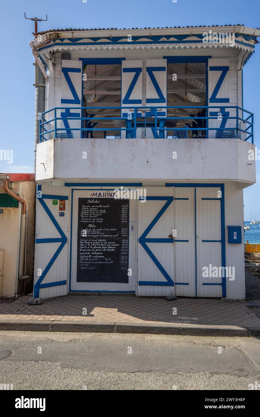 Deshaies, historic Caribbean wooden building of a street in Guadeloupe ...