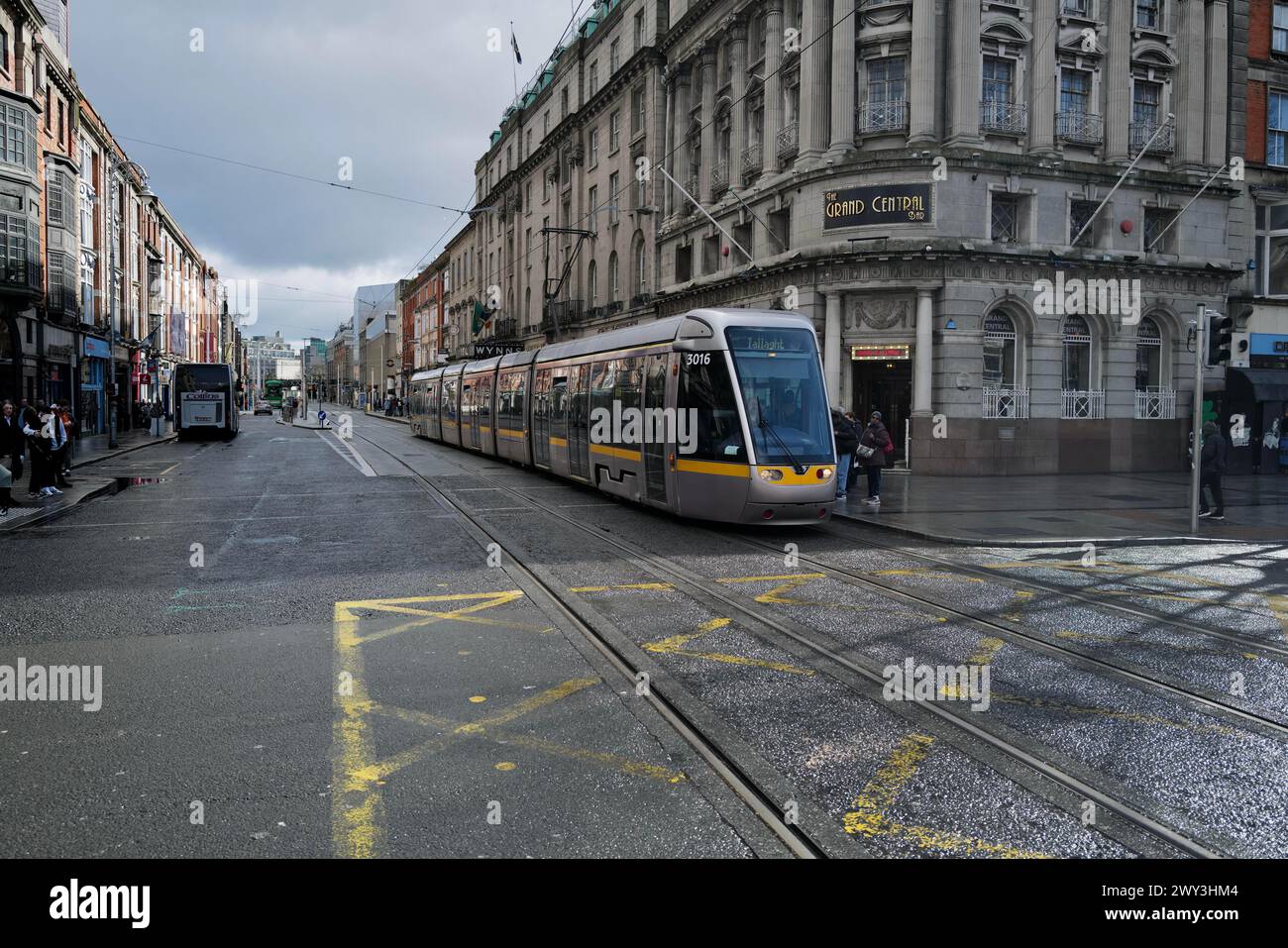 A Luas tram stops for passengers on a day of mixed weather. Dublin ...