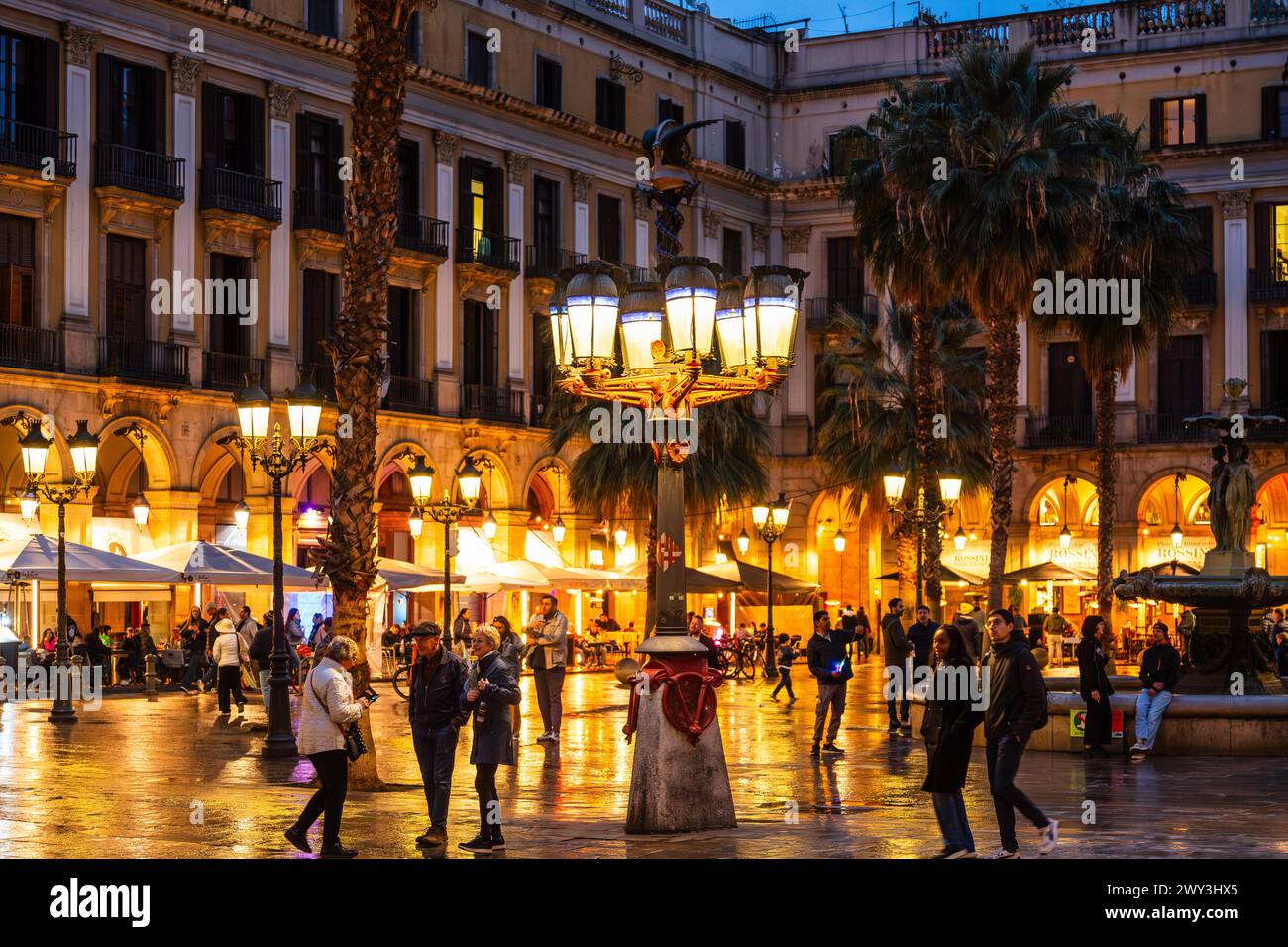 Nightlife at Placa Reial, lanterns by Gaudi in the historic centre of ...