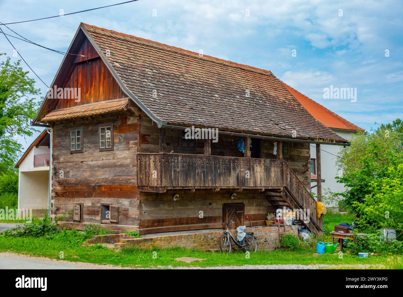 Traditional wooden houses in Croatian village Muzilovcica Stock Photo ...
