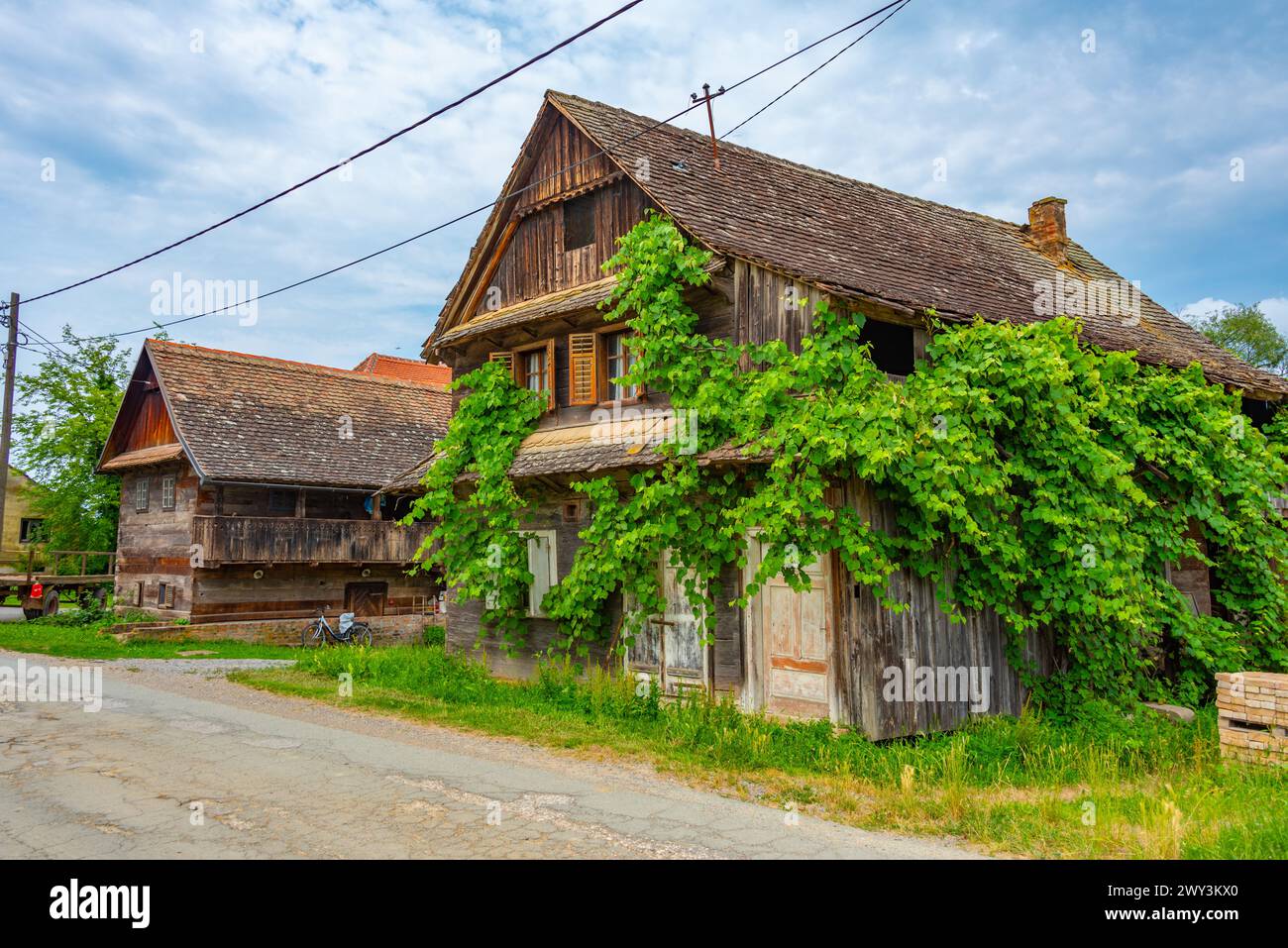 Traditional wooden houses in Croatian village Muzilovcica Stock Photo ...