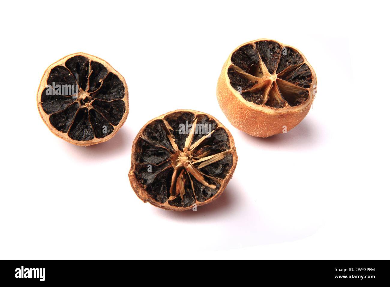 old dried lemons isolated on the white background Stock Photo - Alamy