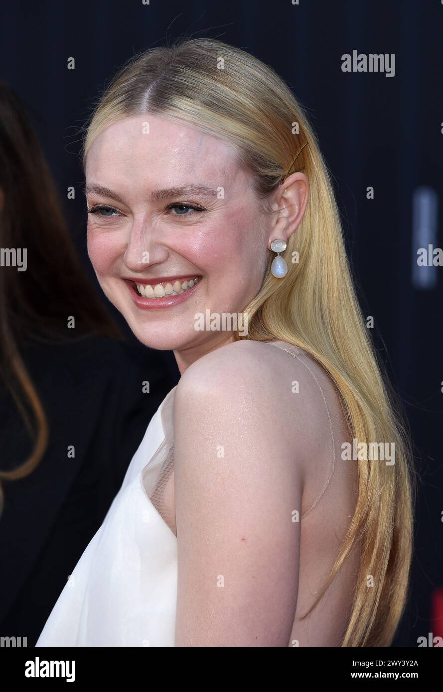 Hollywood, USA. 03rd Apr, 2024. Dakota Fanning arriving at Netflix's ...