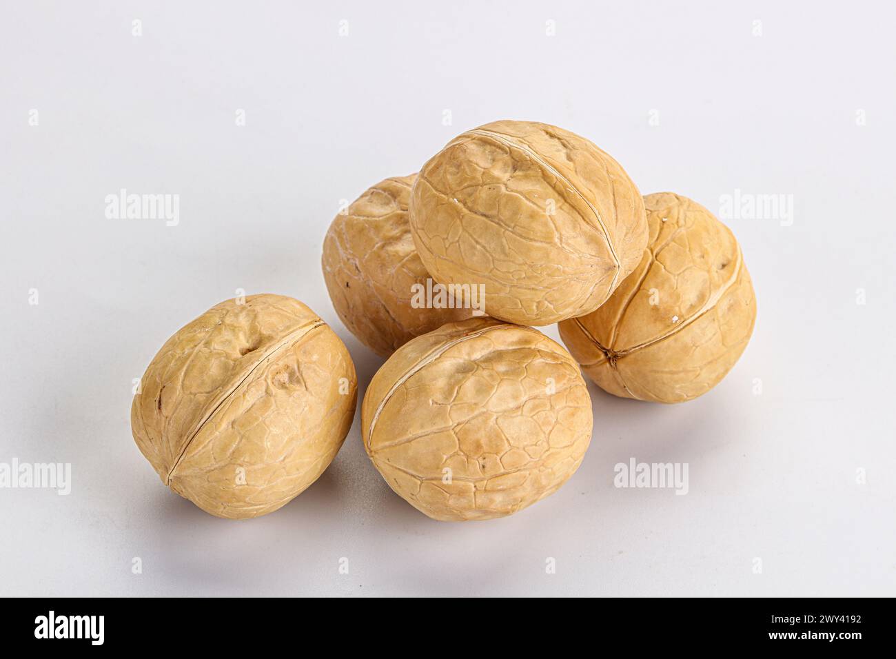Walnut kernel heap organic nut isolated Stock Photo - Alamy