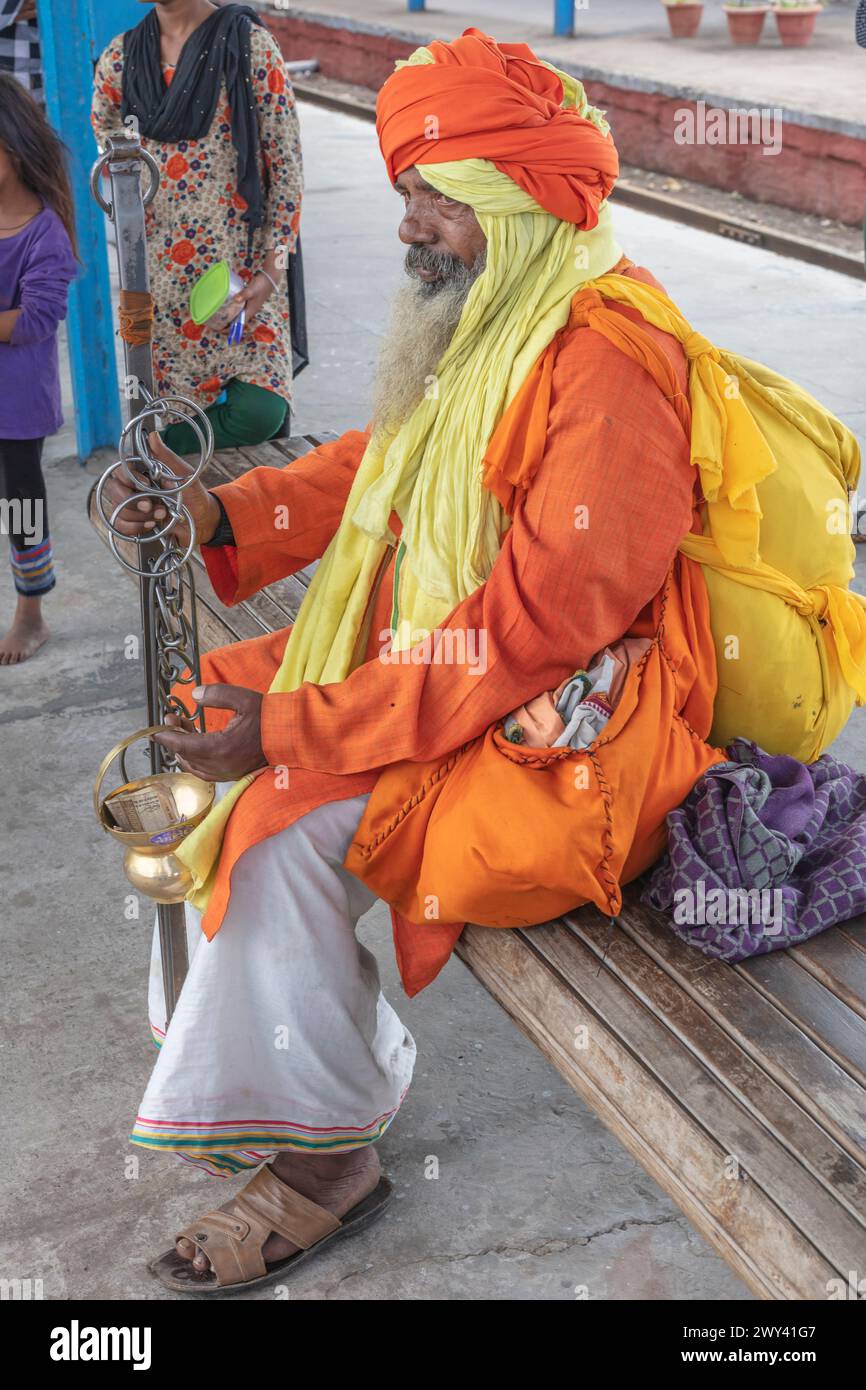 Man in traditional clothes, Kalka railway station of Kalka-Shimla ...