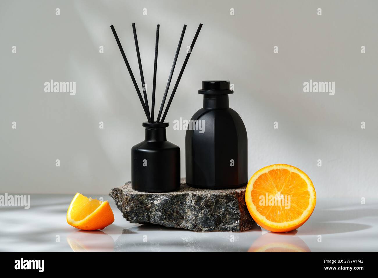 Modern Aromatherapy Diffuser With Orange Accents on a Natural Stone ...