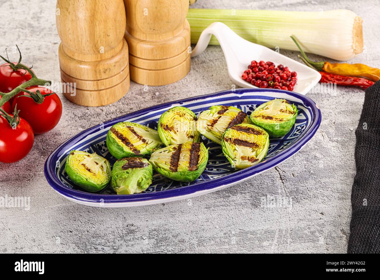 Vegan cuisine Grilled green brussel sprout cabbage Stock Photo - Alamy