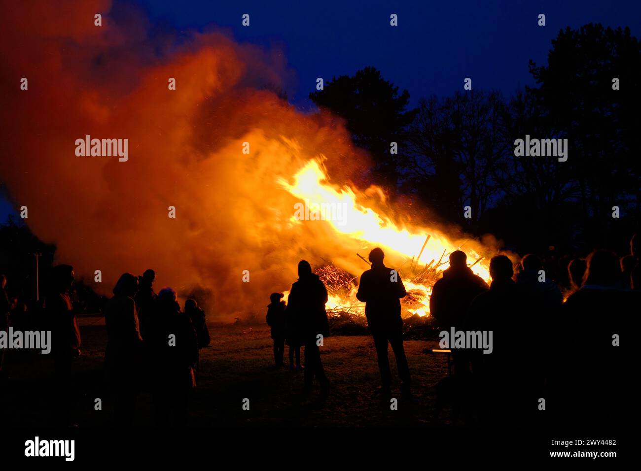 Bright glow fire night silhouettes hi-res stock photography and images ...