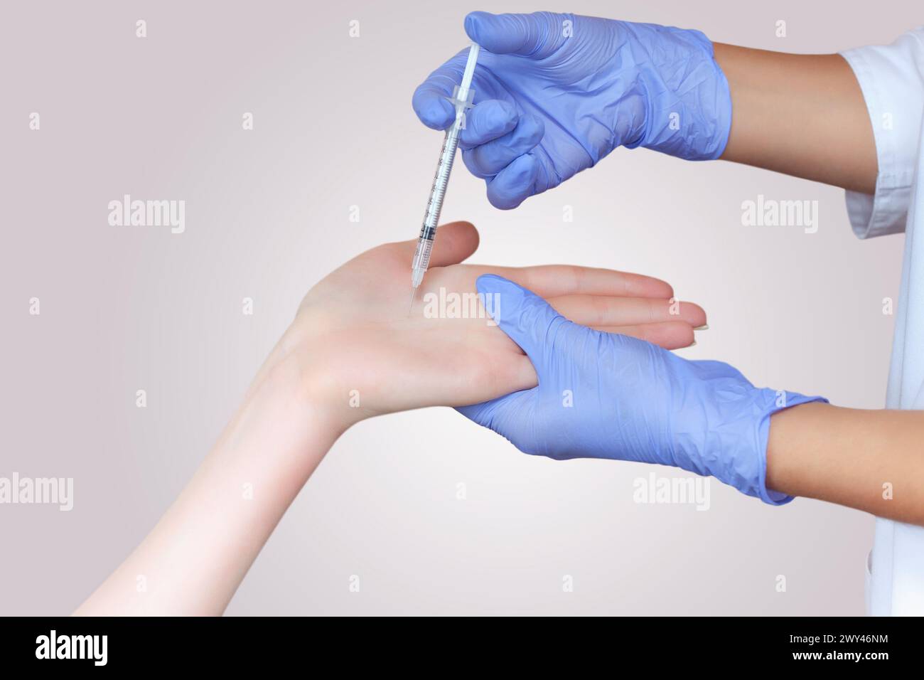 The doctor makes intramuscular injections of botulinum toxinon the ...